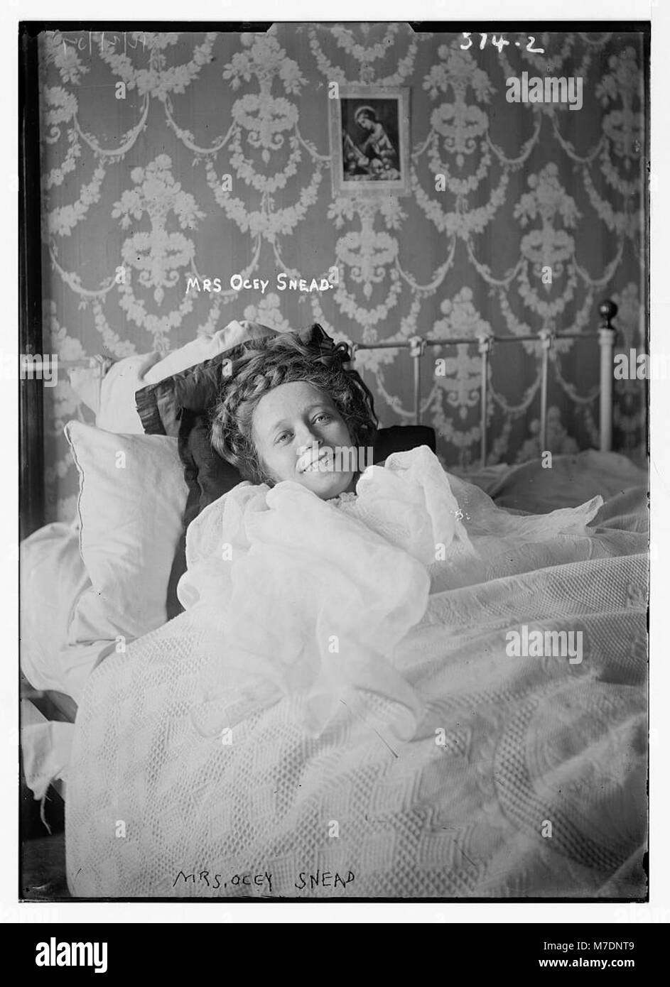The photograph captures Mrs. Ocey Snead in bed, an important historical ...