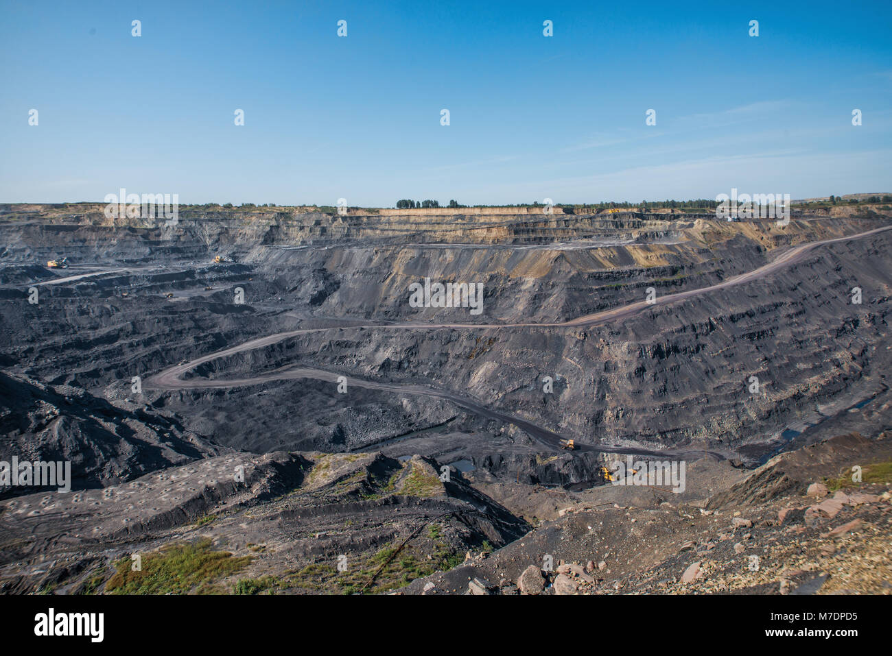 territory of coal mining with traces of truck Stock Photo - Alamy