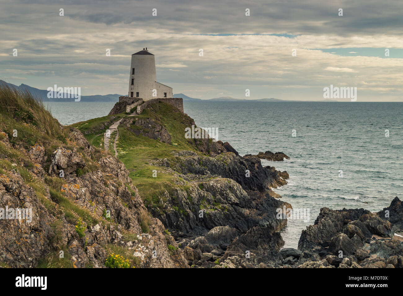 The Llanddwyn island lighthouse, Twr Mawr at Ynys Llanddwyn on Anglesey ...