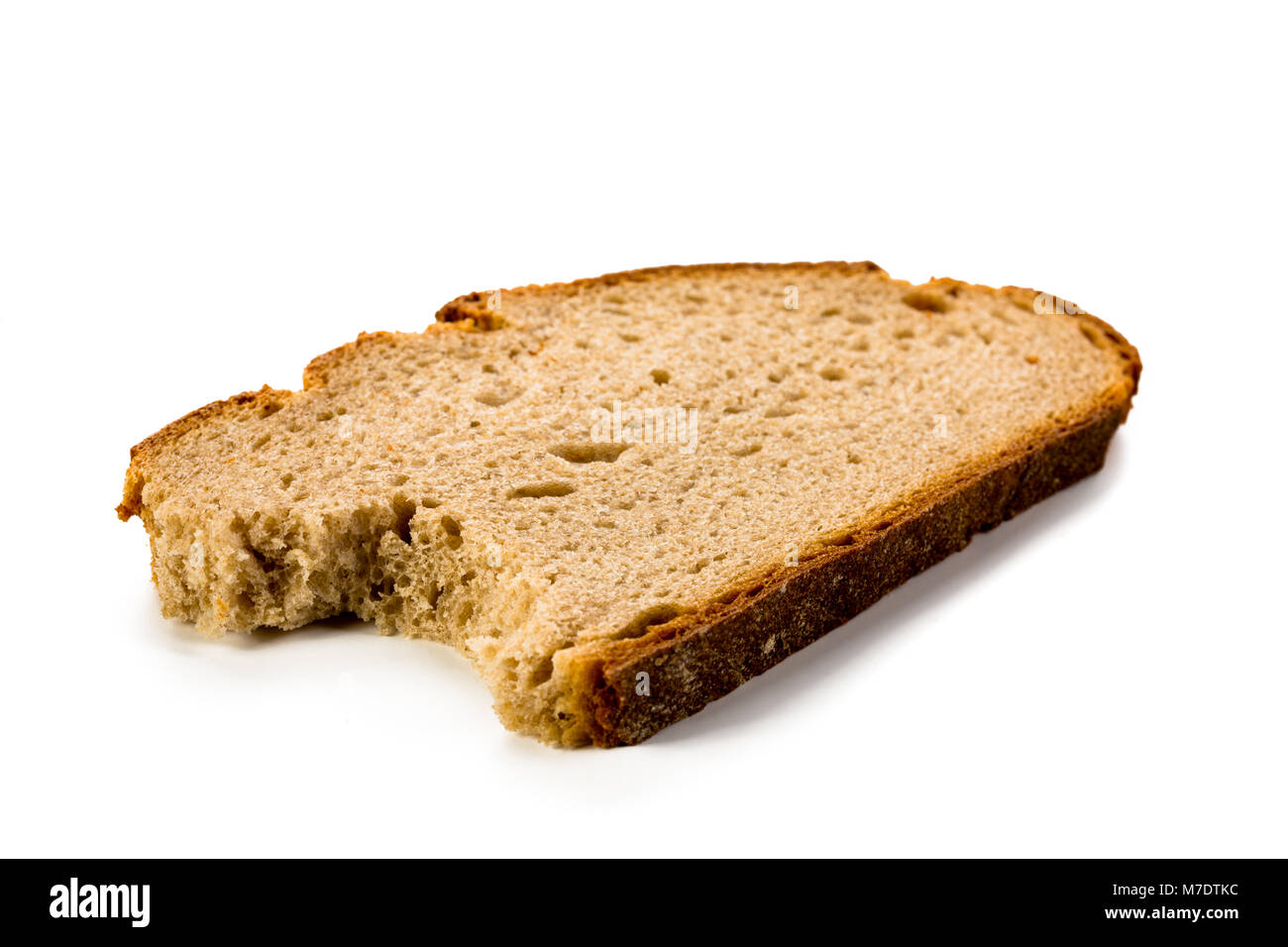 Single slice of bitten bread isolated on white background, front view ...