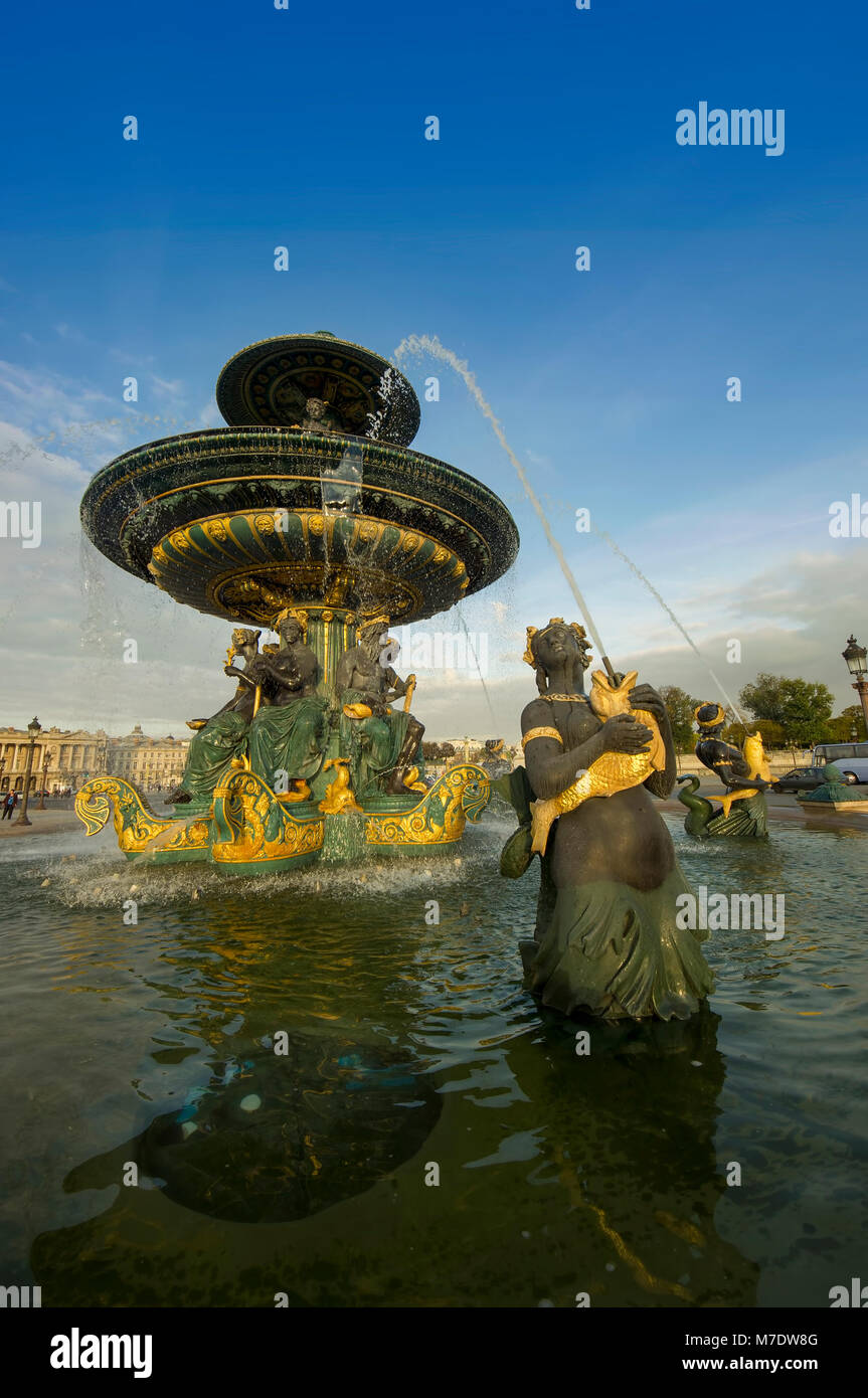 A fountain and the Obelisk on Concorde square (Place de la Concorde) in ...