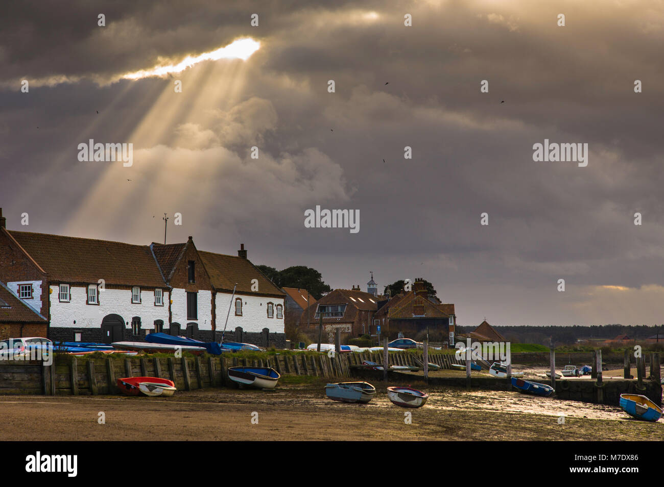 Crepuscular rays also known as God beams at Burnham Overy Staithe Stock ...