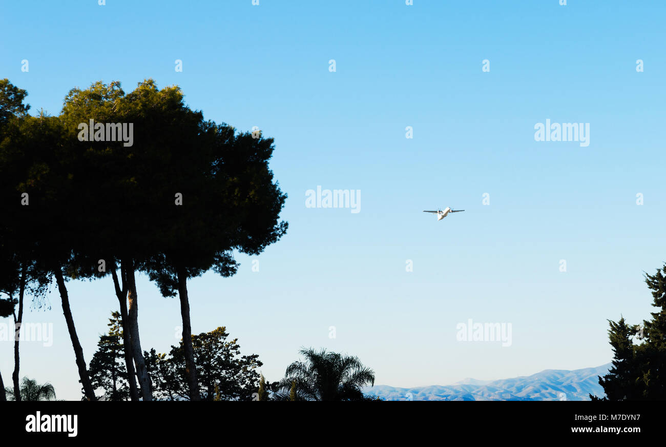 Passenger plane flying in the blue sky, cruise aircraft, transport ...