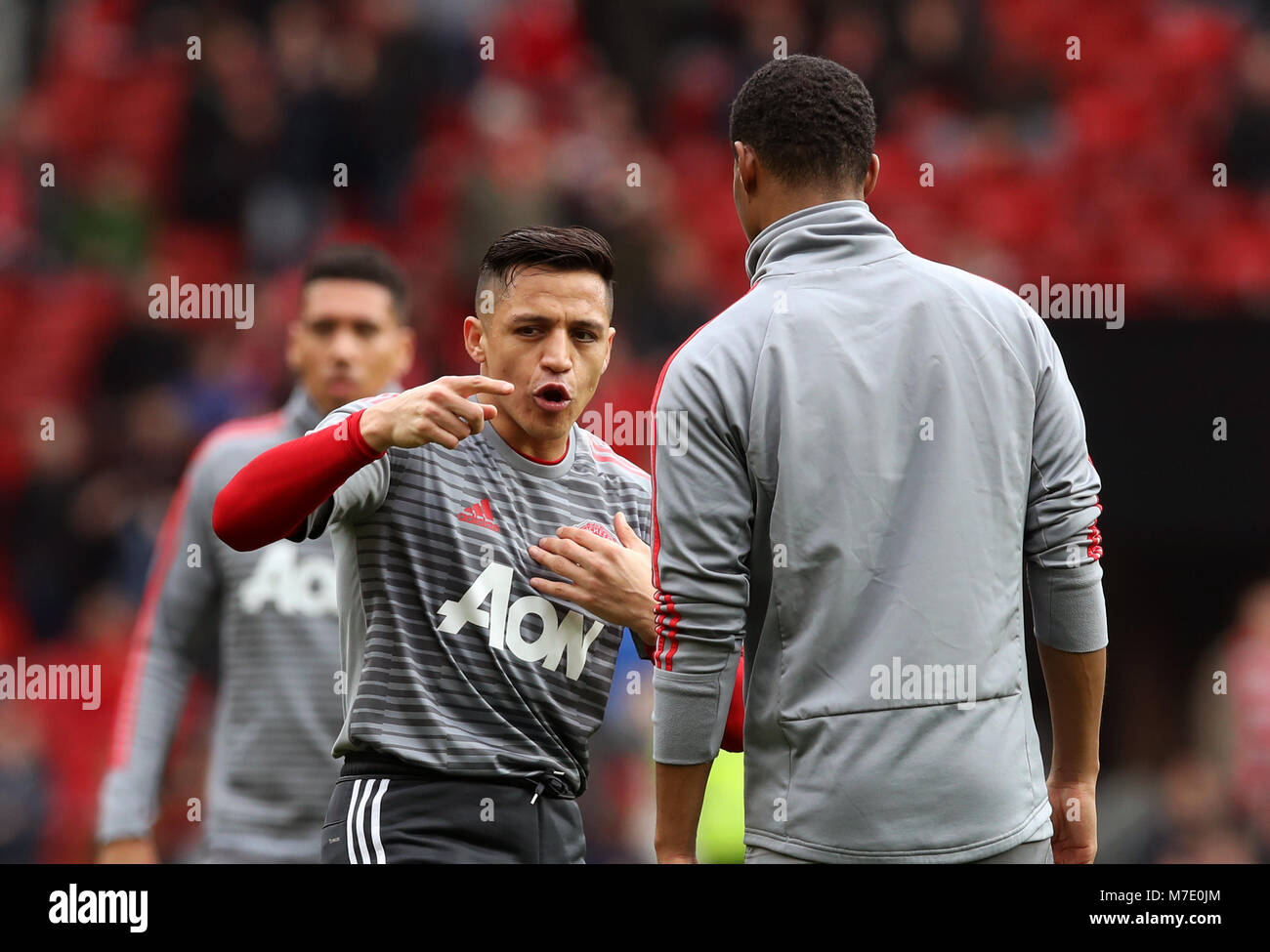 Manchester United's Alexis Sanchez speaks with Marcus Rashford before ...