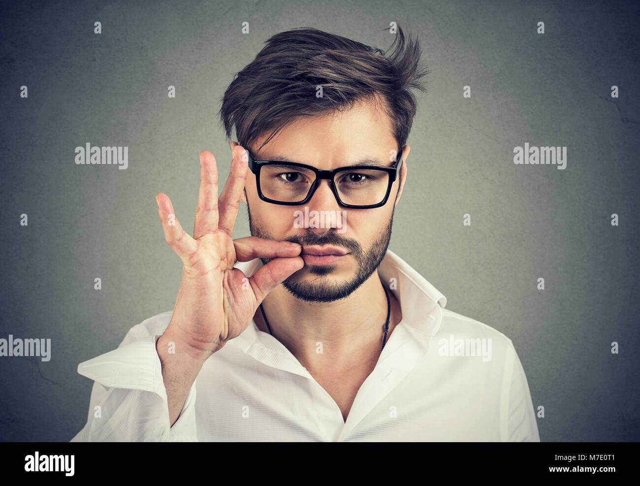 Keep your mouth shut hi-res stock photography and images - Alamy
