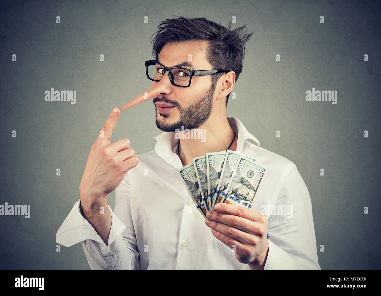 Financial fraud concept. Liar business man with dollar cash Stock Photo ...