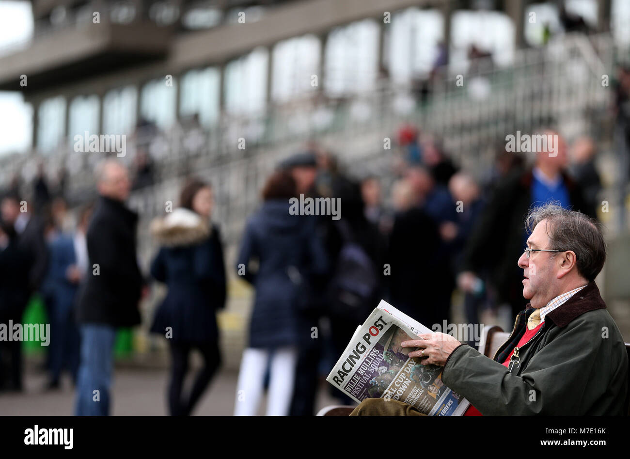 General view of spectators reading the Racing post during Matchbook ...