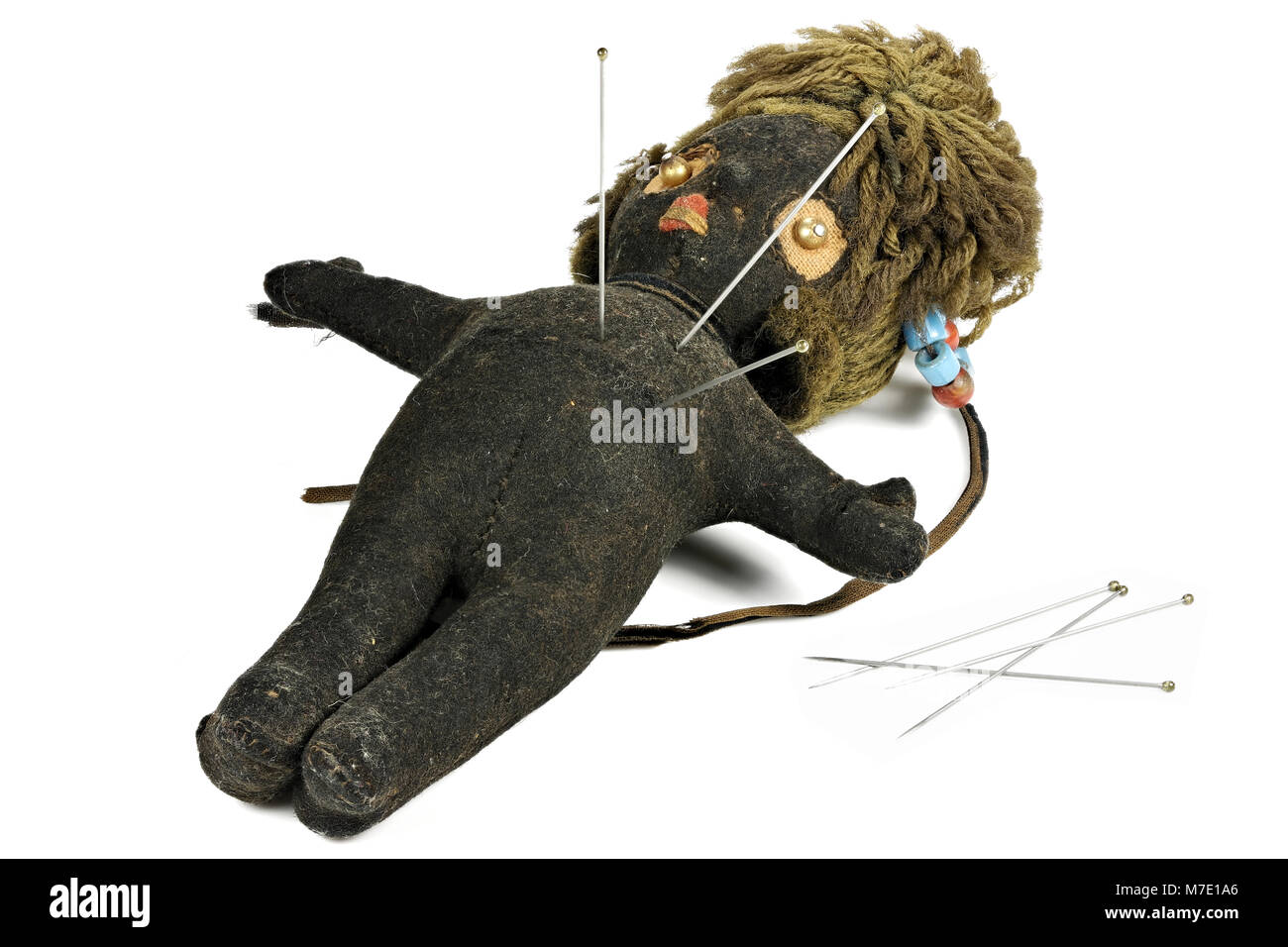 vintage voodoo doll isolated on white background Stock Photo - Alamy