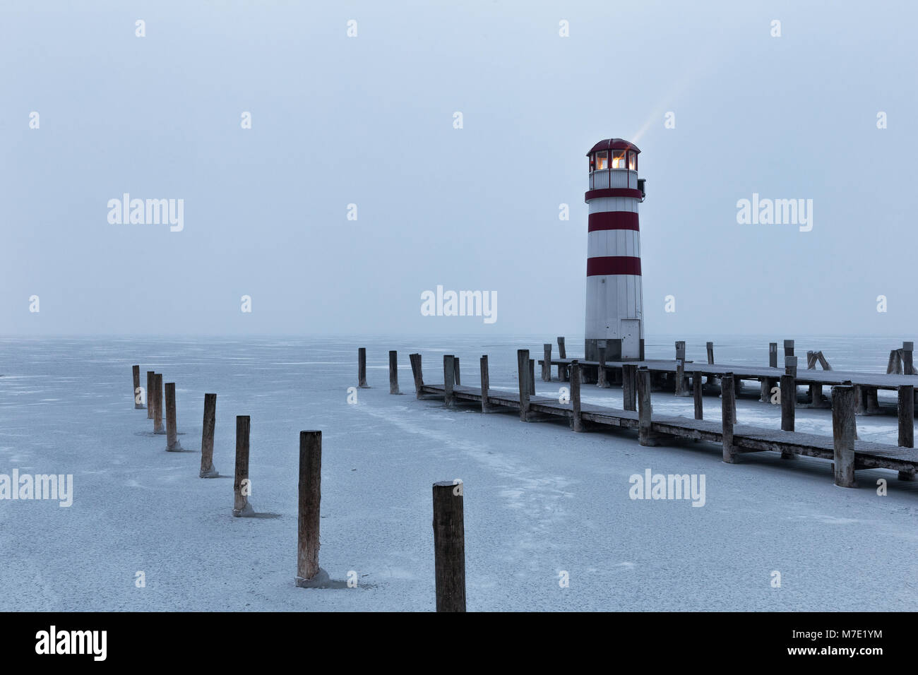 Morning with rain and fog, lighthouse at winter Stock Photo - Alamy