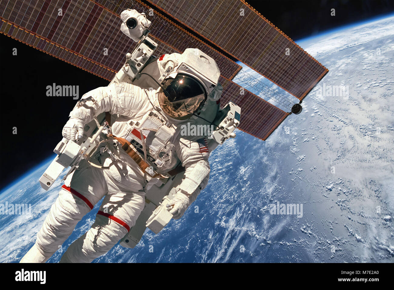 International Space Station and astronaut in outer space over the ...