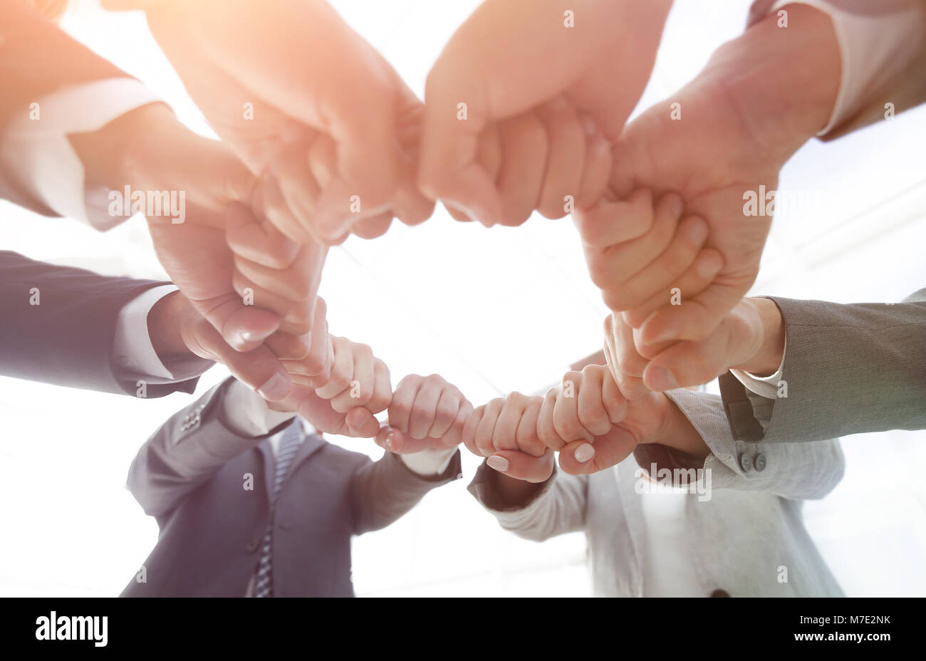 group of people joined their hands Stock Photo - Alamy