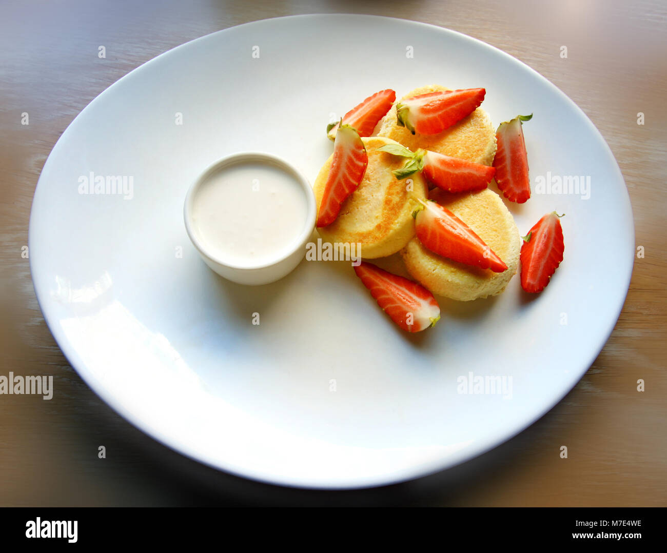 Photo of a macro of delicious cheese cakes with strawberries on a sunny ...