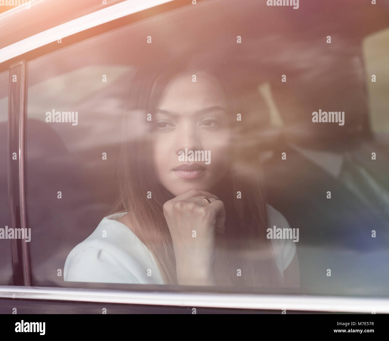 thoughtful business woman sitting in car backseat Stock Photo - Alamy thoughtful business woman sitting in car backseat Stock Photo - Alamy