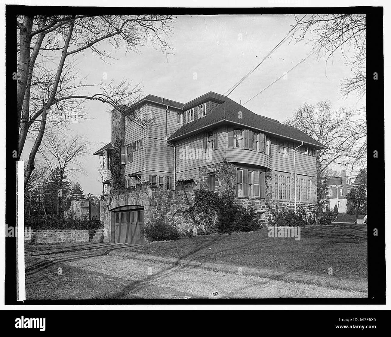 A formal portrait of Mrs. Wilson Compton, capturing her dignified ...