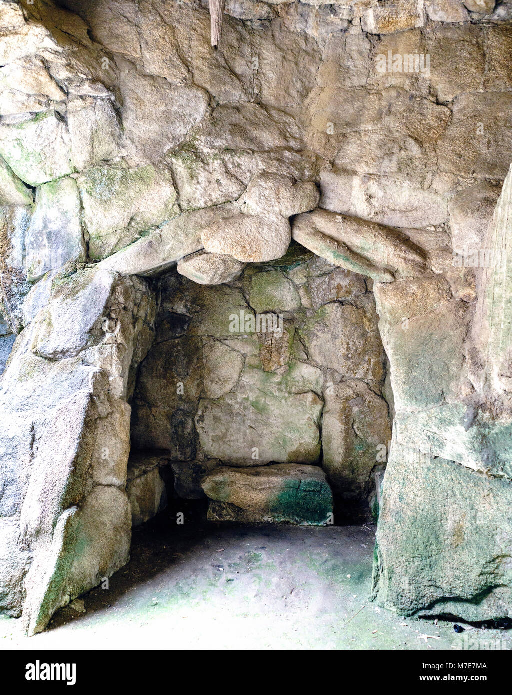 Small stone hollow with a bench for rest. Park of the brothers Naveira ...