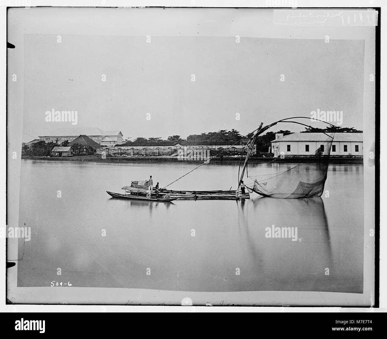A photograph capturing a native fisherman in Manila, Philippines, using ...