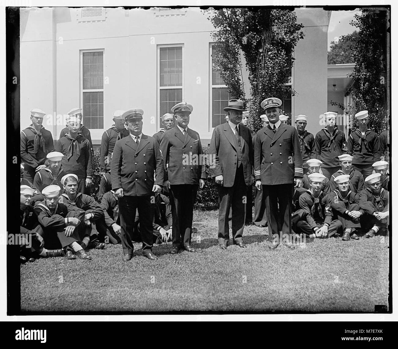 This image depicts a scene from the U.S. Navy, showing naval personnel ...
