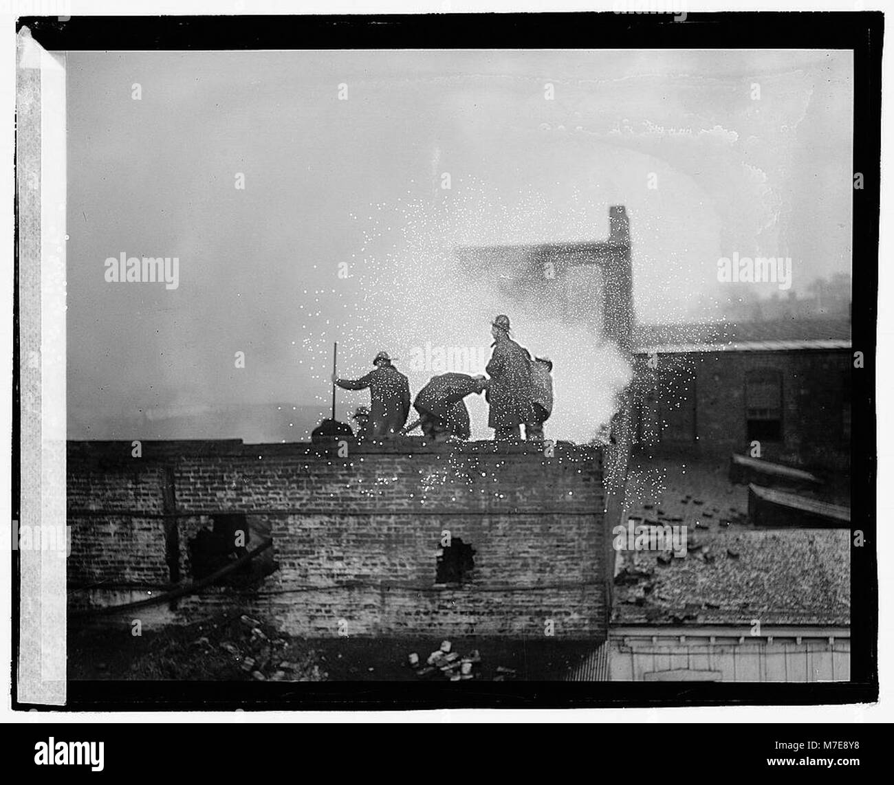 A historical photograph documenting the Nixon Brewer fire at 7th and B ...