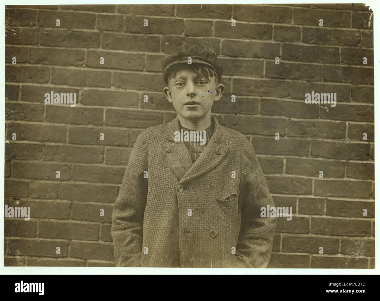 A photograph of a boy working at Bates Manufacturing Company in ...