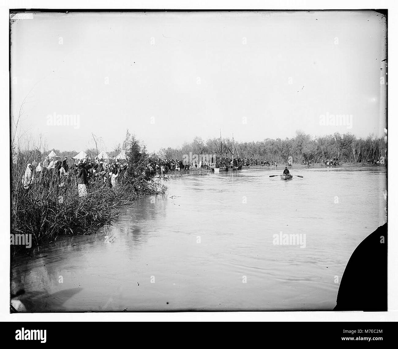 A historical photograph of Russian pilgrims on their journey to Jericho ...