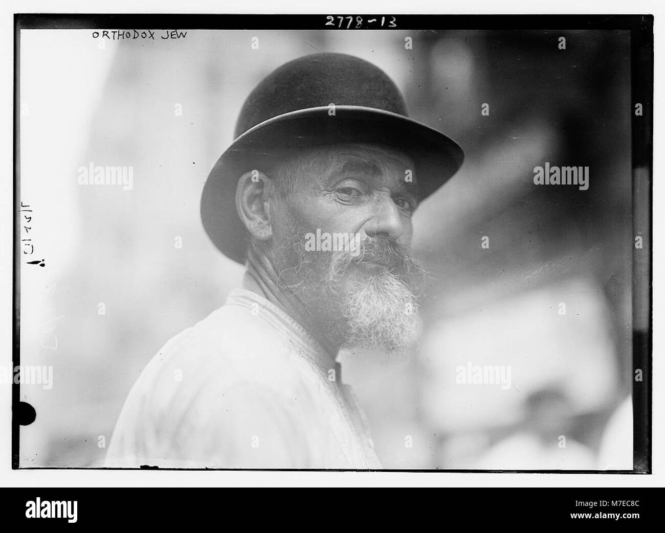 An image depicting an Orthodox Jew, showcasing the traditional attire ...