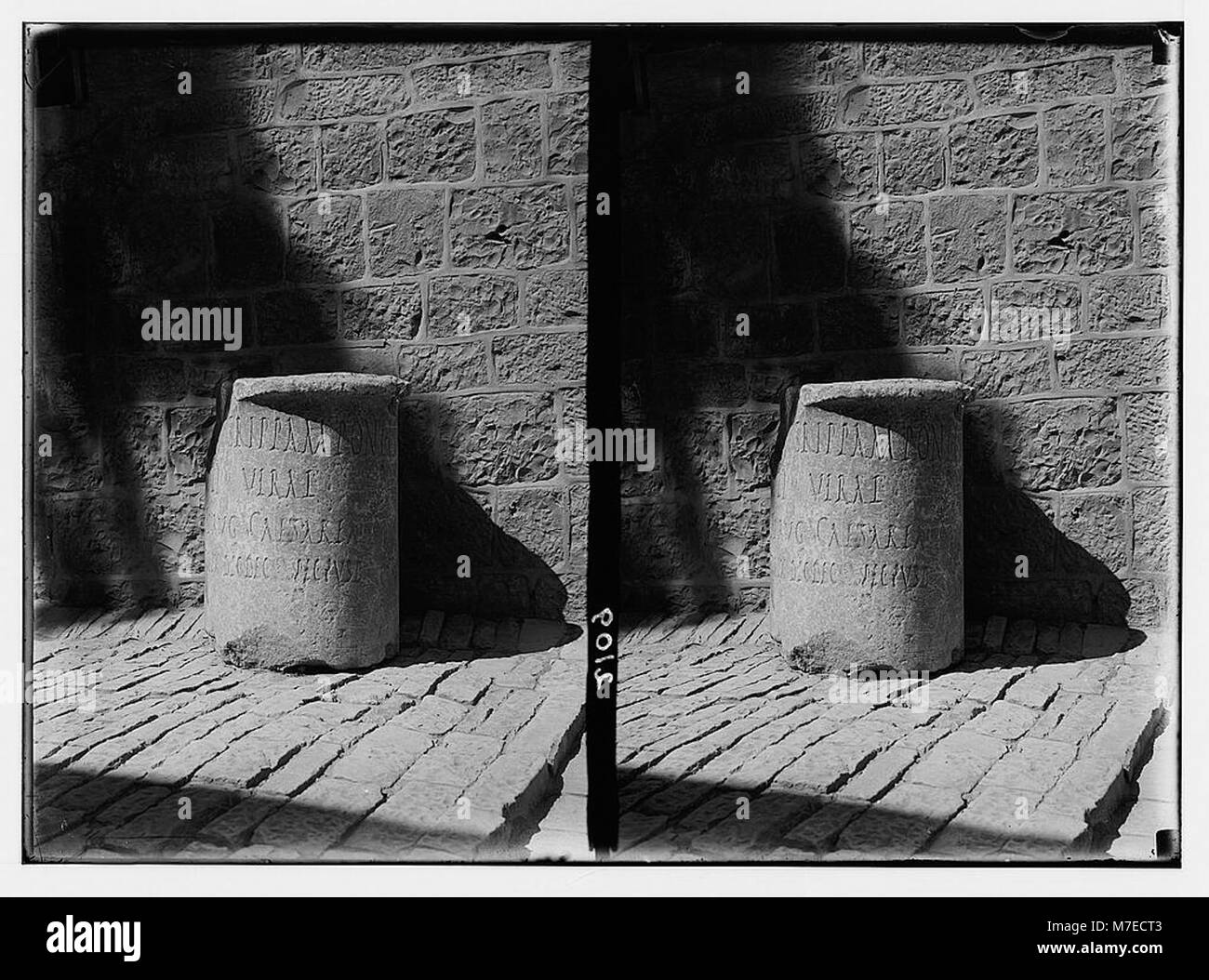 This image depicts a Roman milestone located at the Palestine ...