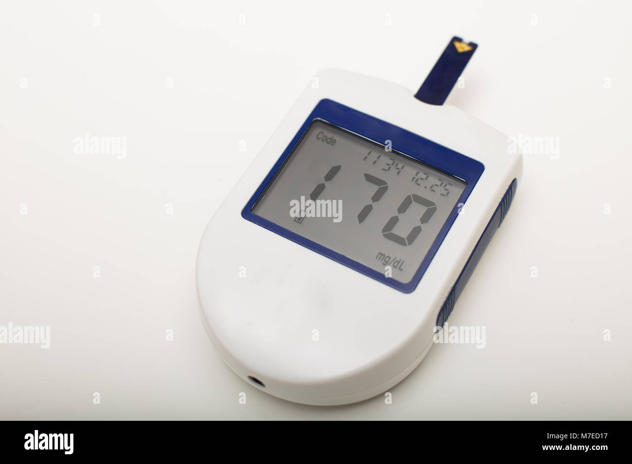 Small portable digital blood glucose meter for use by a diabetic to ...