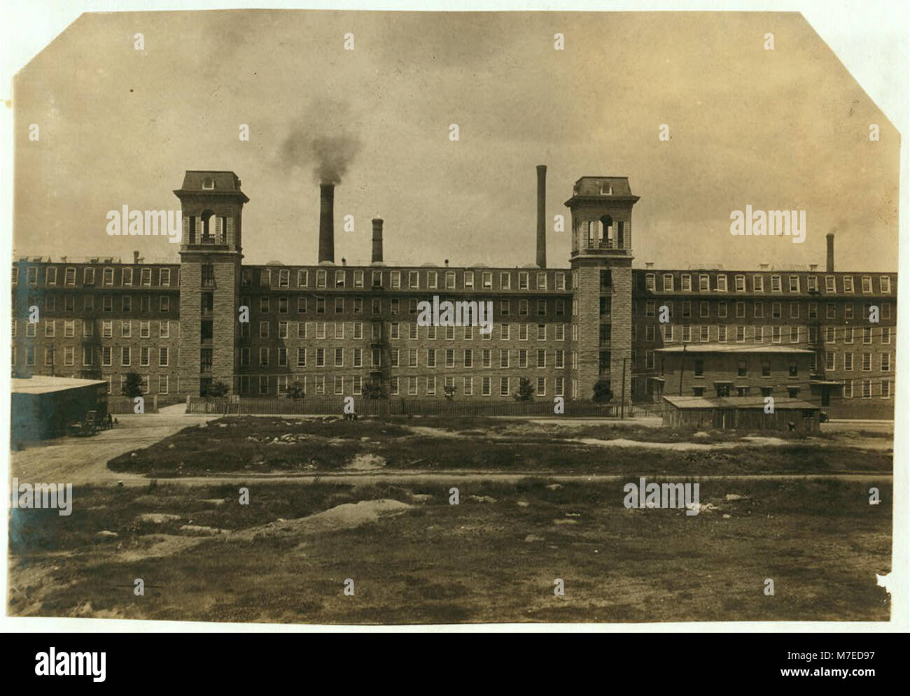 This photograph shows part of the Merchants Mill, with sections built ...