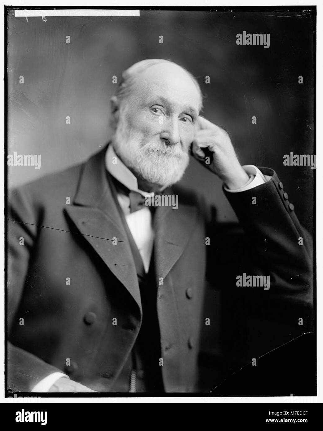 A formal image of Professor J.K. Patterson, highlighting his academic ...