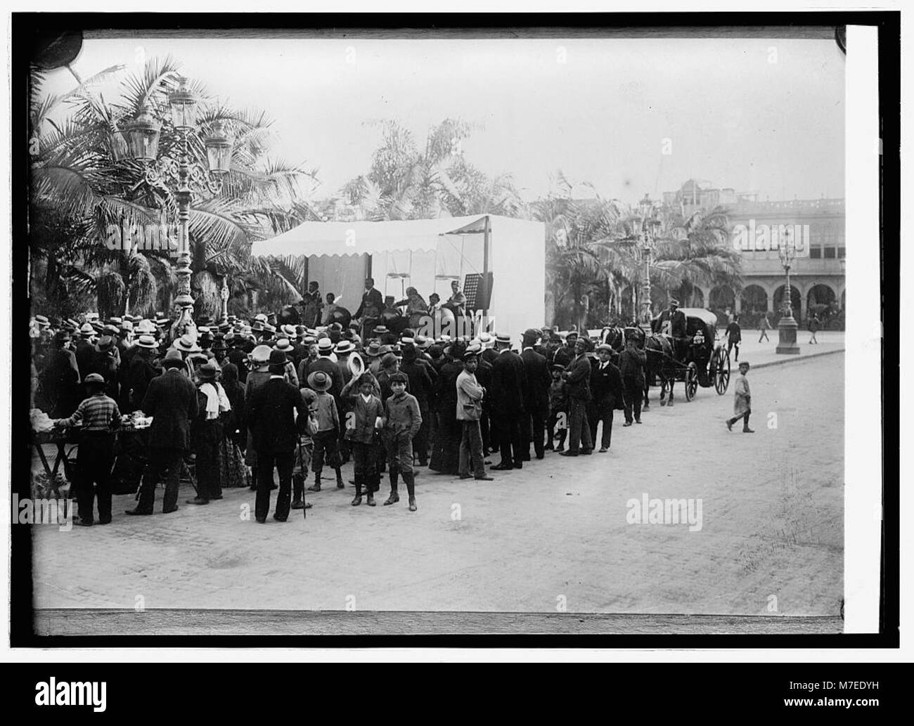 Photograph of a lottery drawing in Lima, Peru, depicting the process of ...