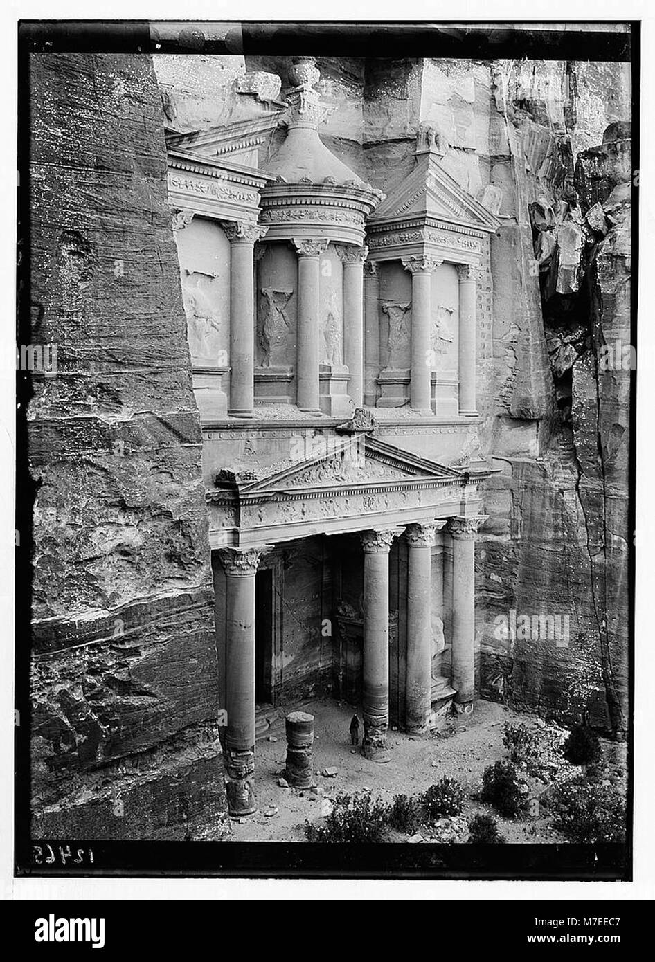 A side view of the Khazneh, a famous ancient structure in Petra, Jordan ...
