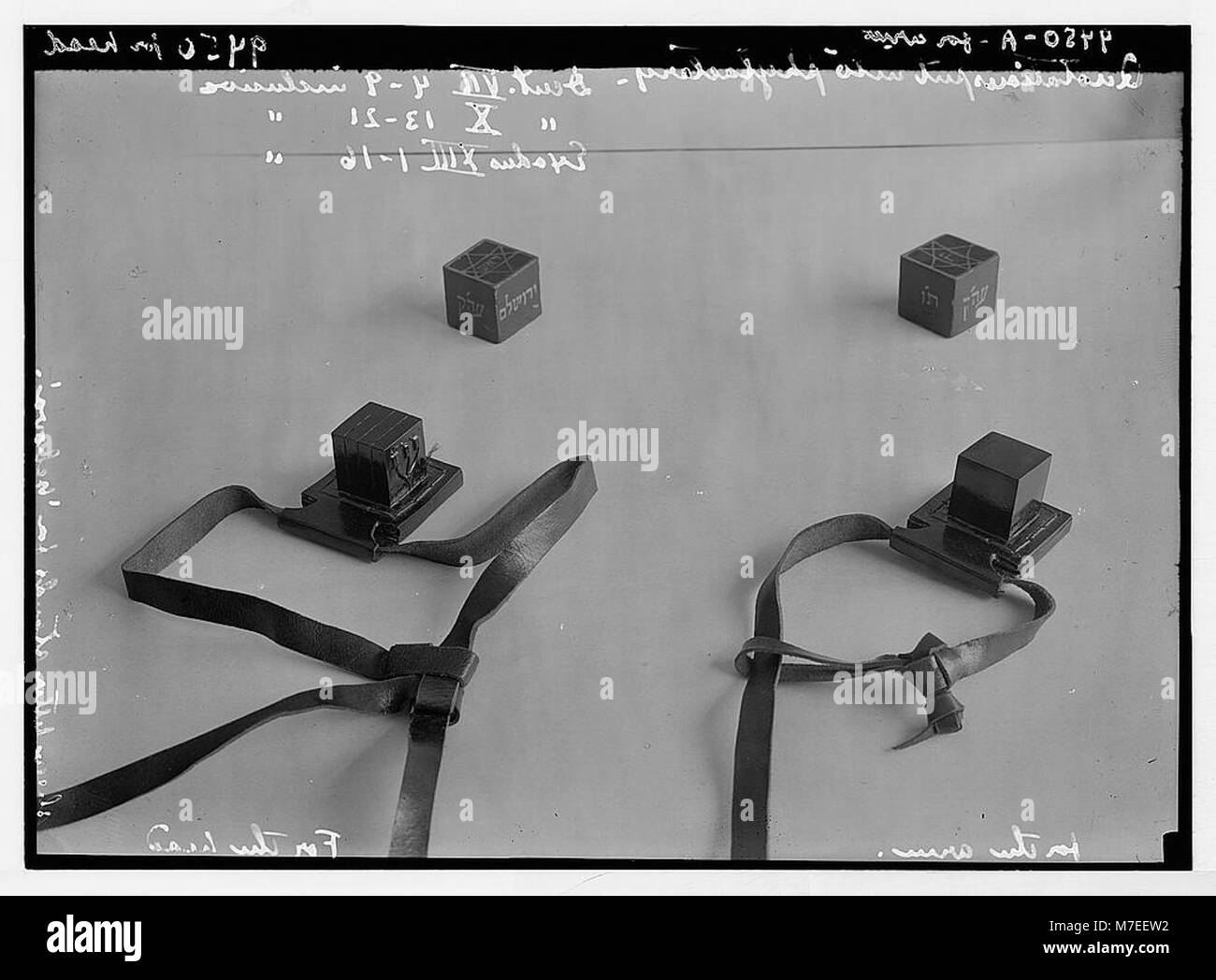 A detailed image showing phylacteries, Jewish ritual objects worn ...