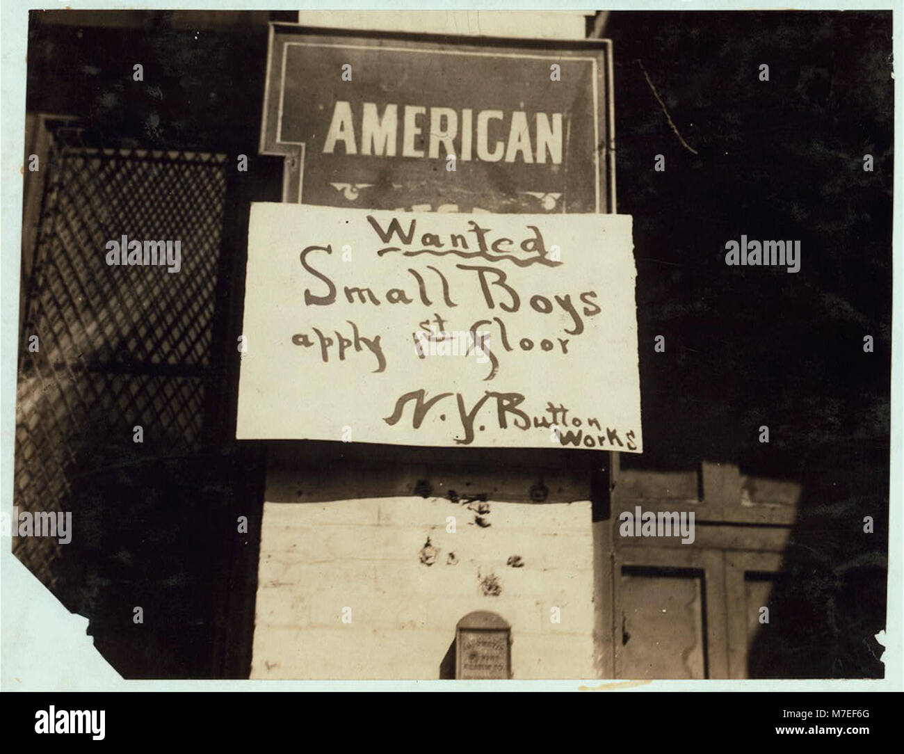 A photograph of an early 20th-century 'Boy Wanted' sign displayed on ...