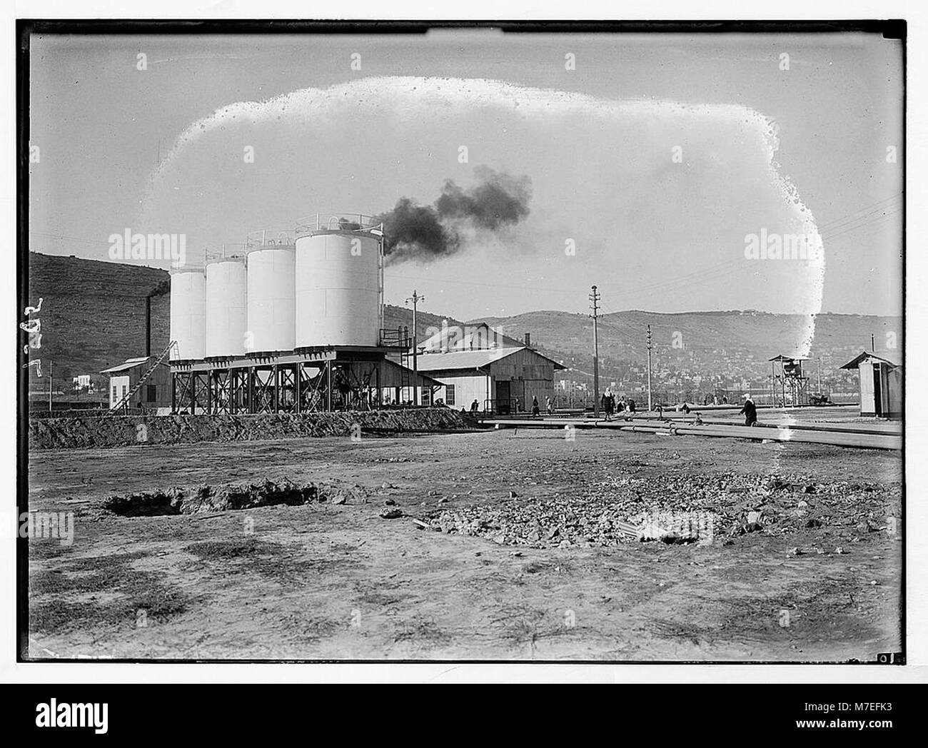 A photograph showing Shell oil tanks near Haifa, Israel, with ...