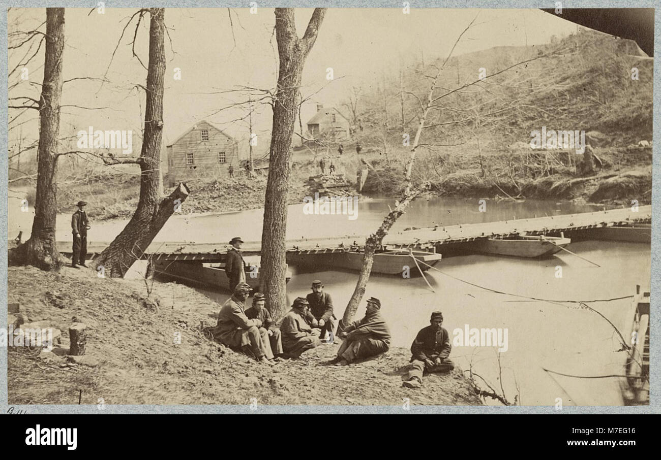 A pontoon bridge spans the Hazel River in Virginia during March 1864 ...