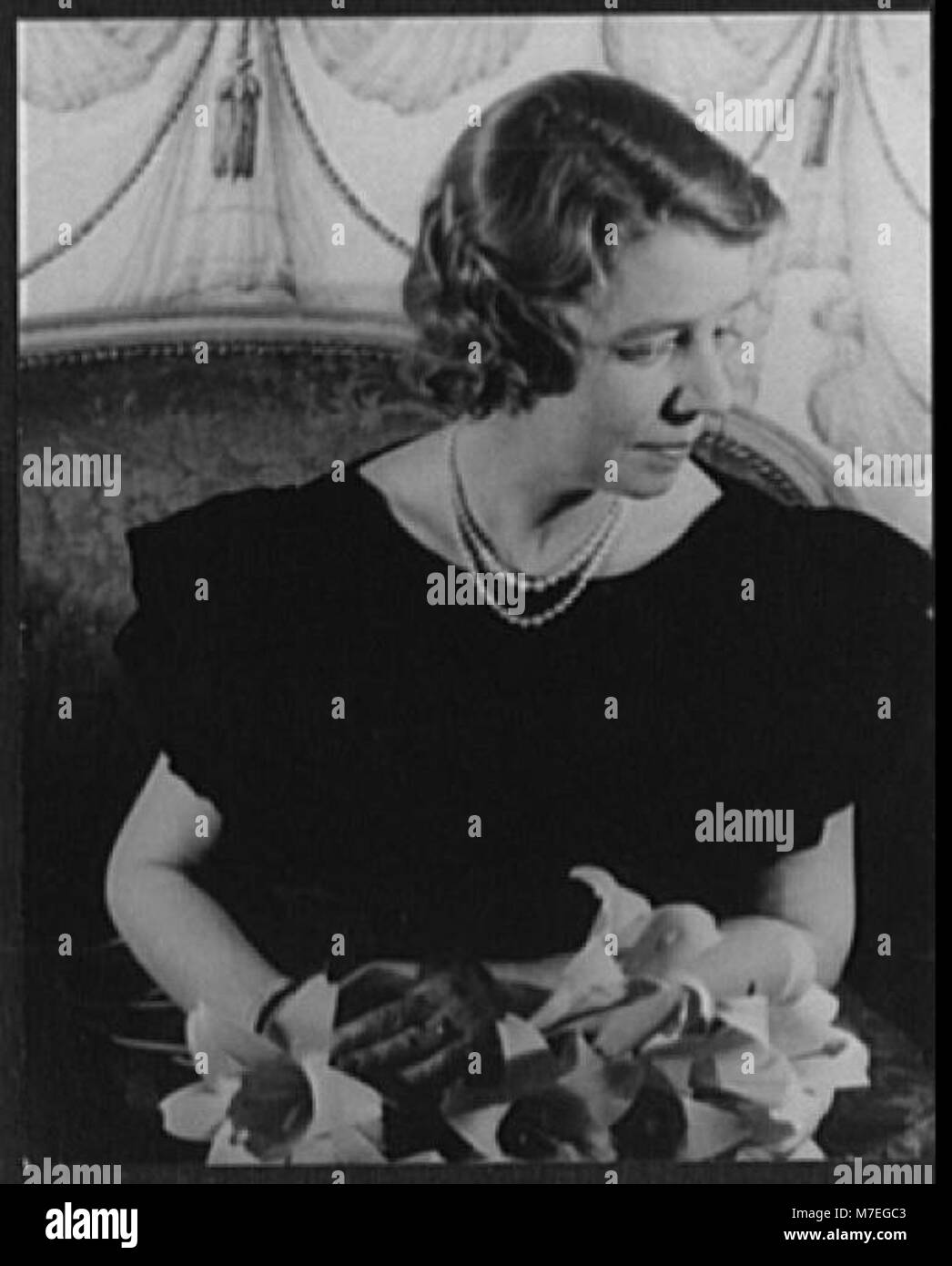 A formal portrait of Bertha Case, capturing her likeness in a ...