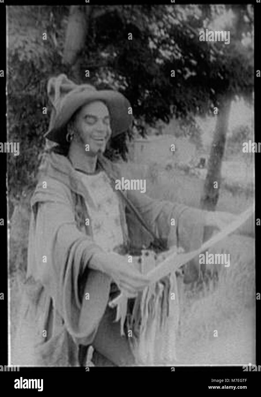 A portrait of Earle Hyman as Autolycus in a production of Shakespeare's ...