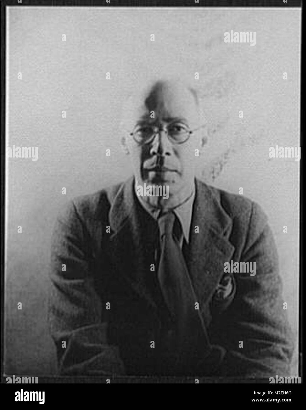 A portrait of Henry Miller, an individual captured in the early 20th ...