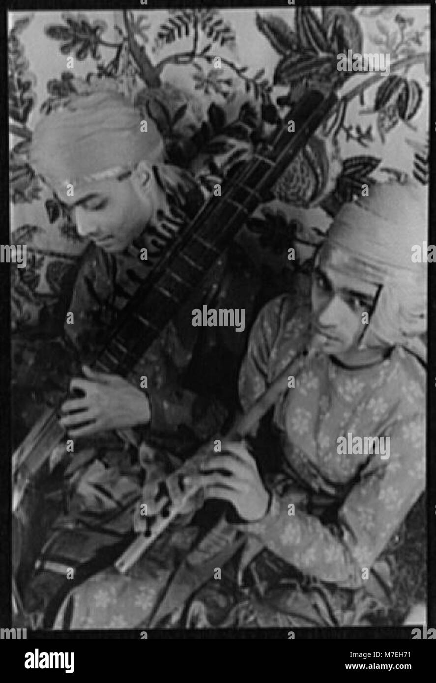 A portrait of Hindu musicians, including Shan-kar, captured in ...