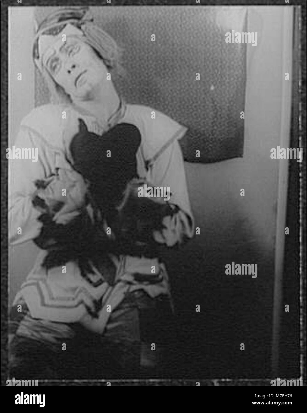 The image presents a portrait of Hugh Laing, an American ballet dancer ...