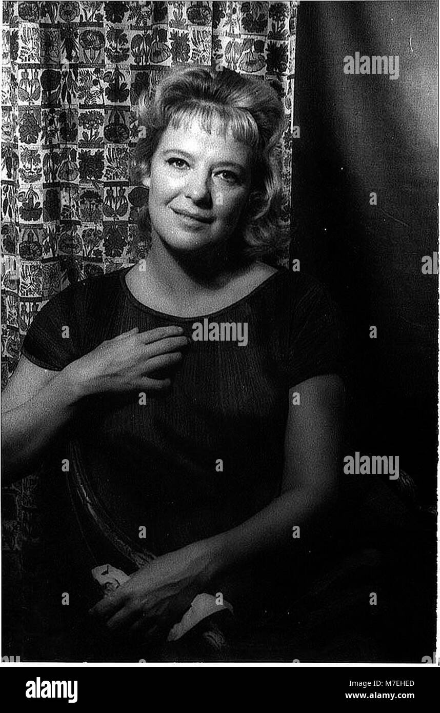 A formal portrait of Kim Stanley, showcasing the actor in a posed ...