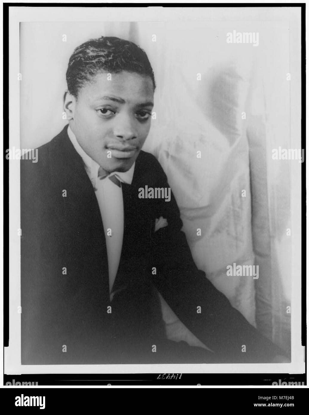 A formal portrait of Roy Atkins, an individual recognized for his ...