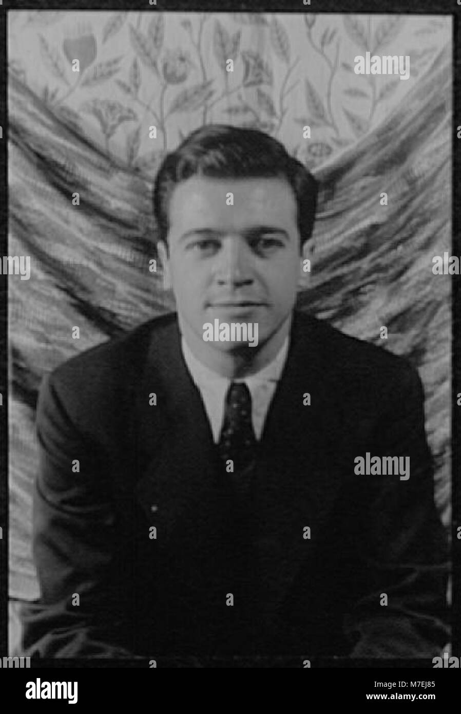 A portrait of Trader Faulkner, offering a visual representation of this ...