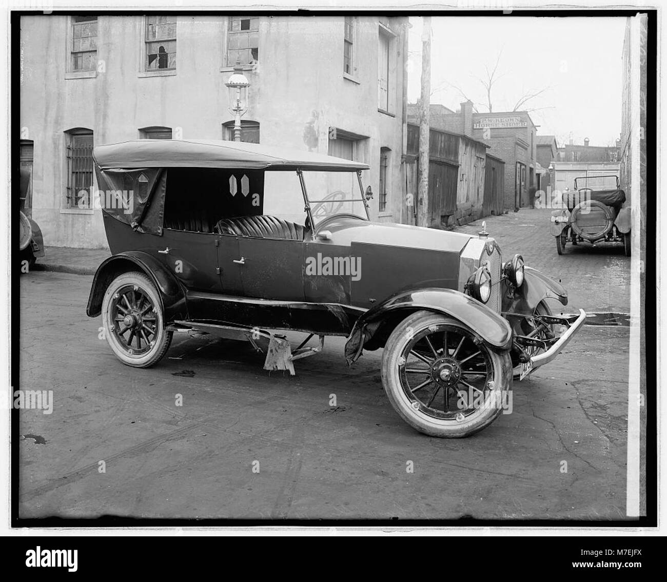 A photograph of a wrecked vessel belonging to the Potomac Sales Company ...