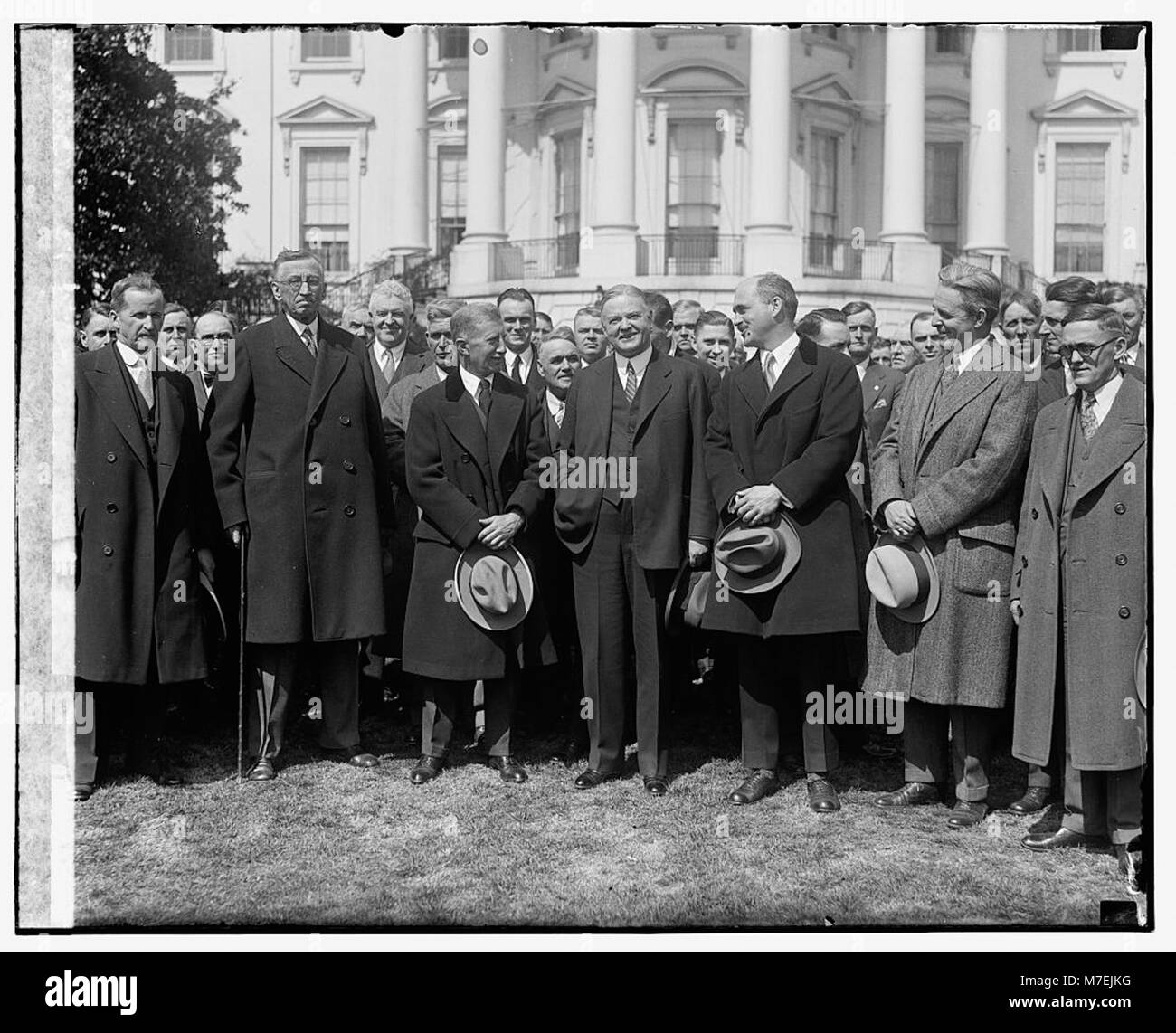 A formal portrait of President Herbert Hoover, reflecting his ...