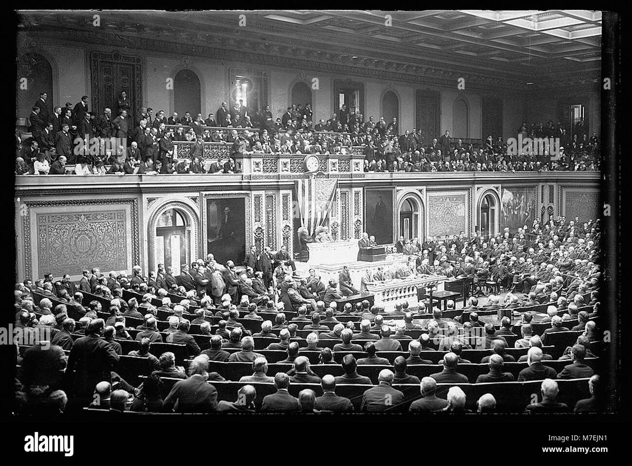 President Woodrow Wilson addressing Congress during a pivotal moment in ...