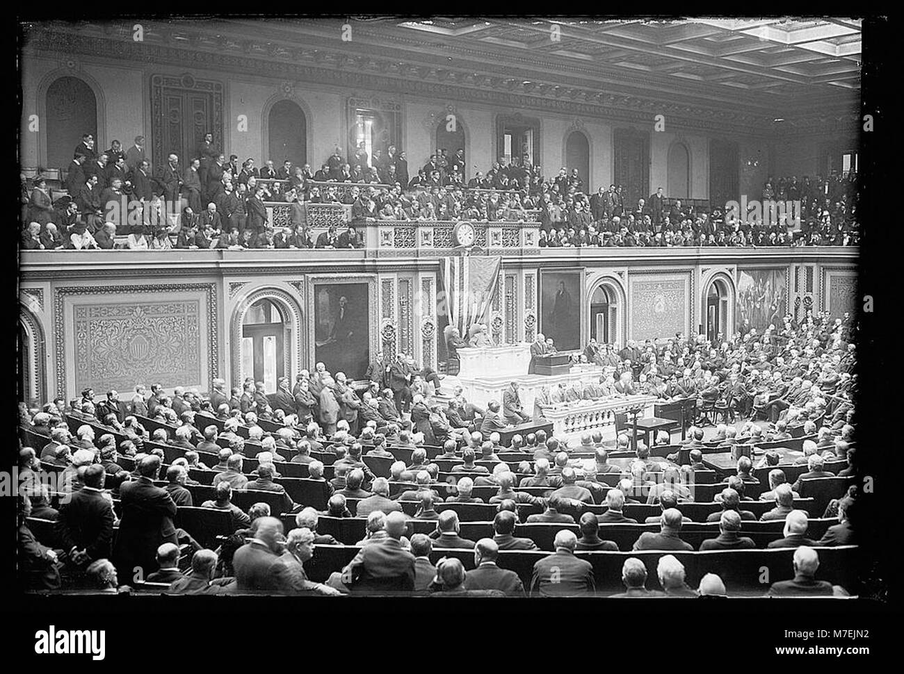 A historical image of President Woodrow Wilson addressing Congress ...