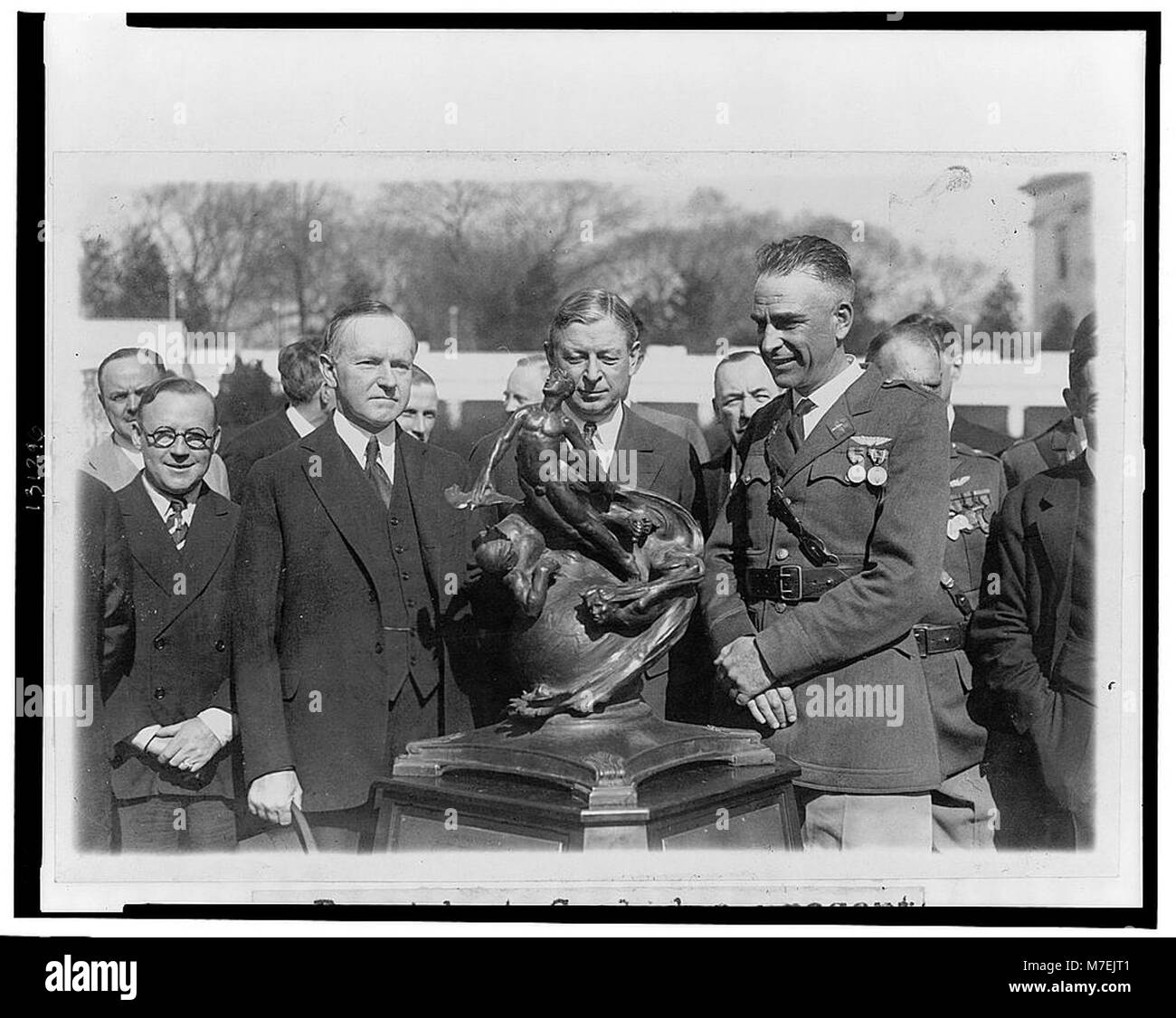A photograph of President Calvin Coolidge presenting the Collier Trophy ...
