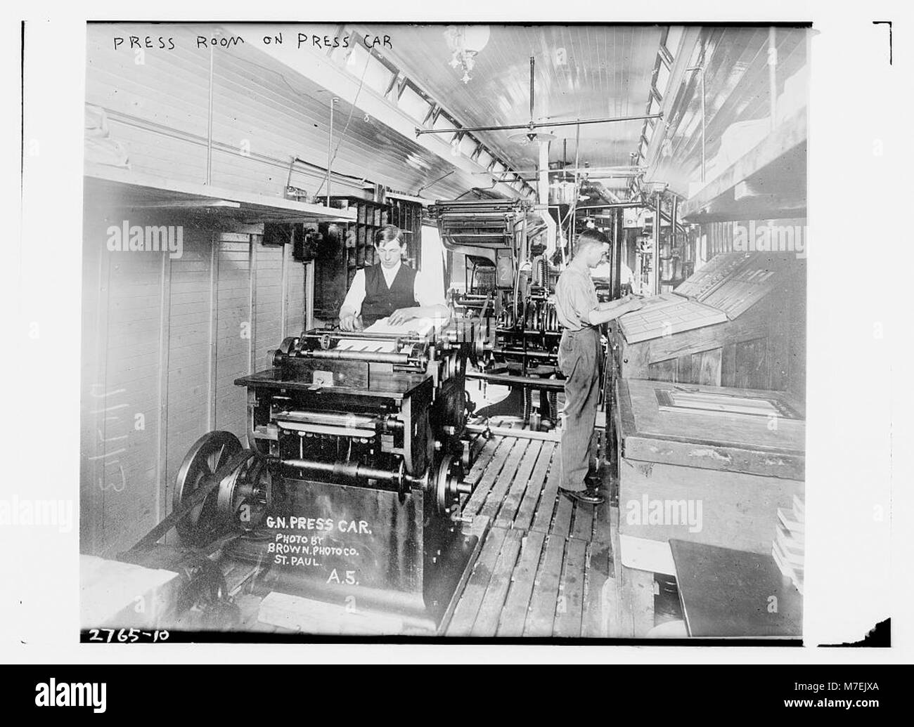 This image captures the press room inside a press car, a mobile office ...