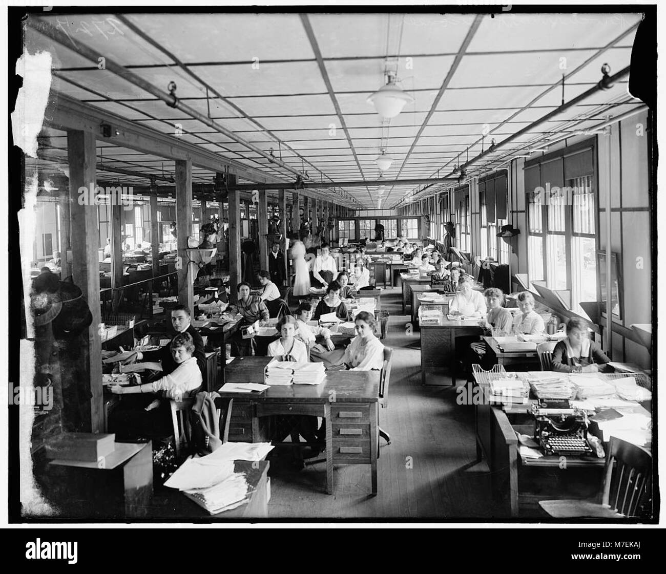 A photograph of procurement personnel, highlighting the key individuals ...